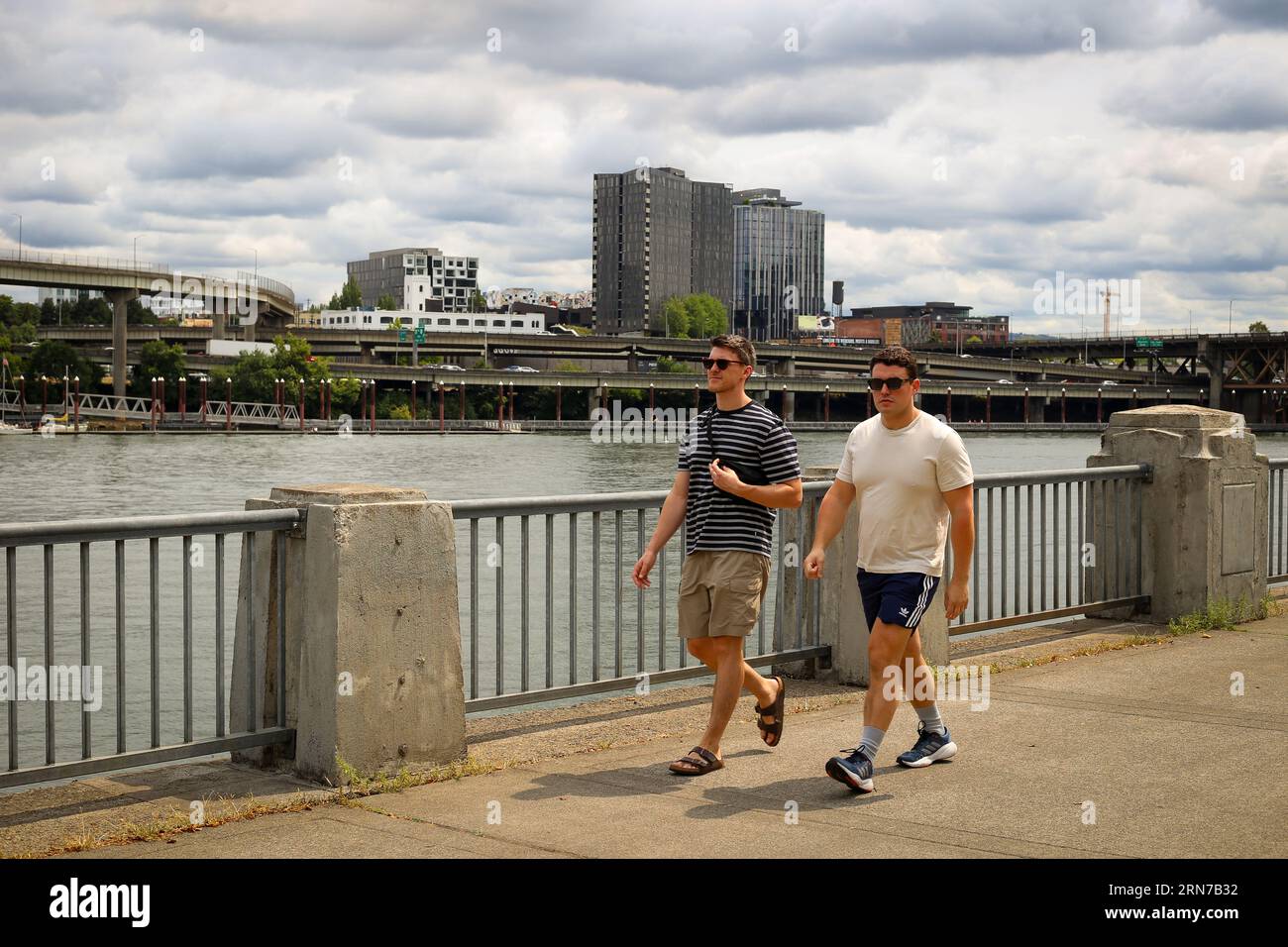 Two men walking along the Willamette River Waterfront in Gov Tom McCall ...