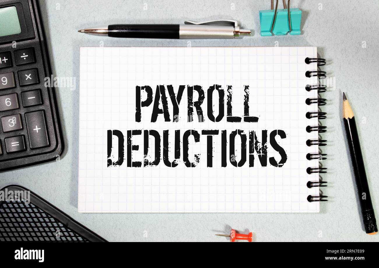 Selective focus.Calculator,pencil and banknotes with the word Payroll ...