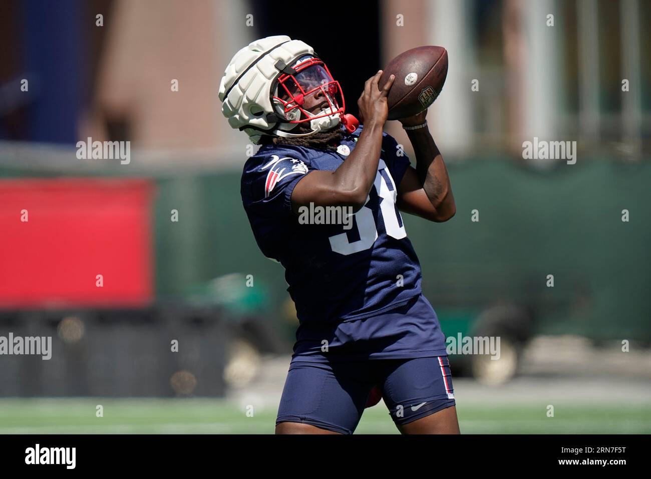 New England Patriots running back Rhamondre Stevenson (38) makes a ...