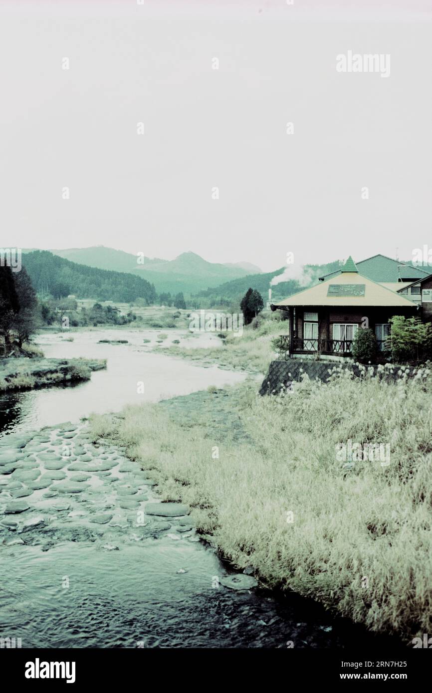 Traditional Japanese house on a river in the countryside Stock Photo ...