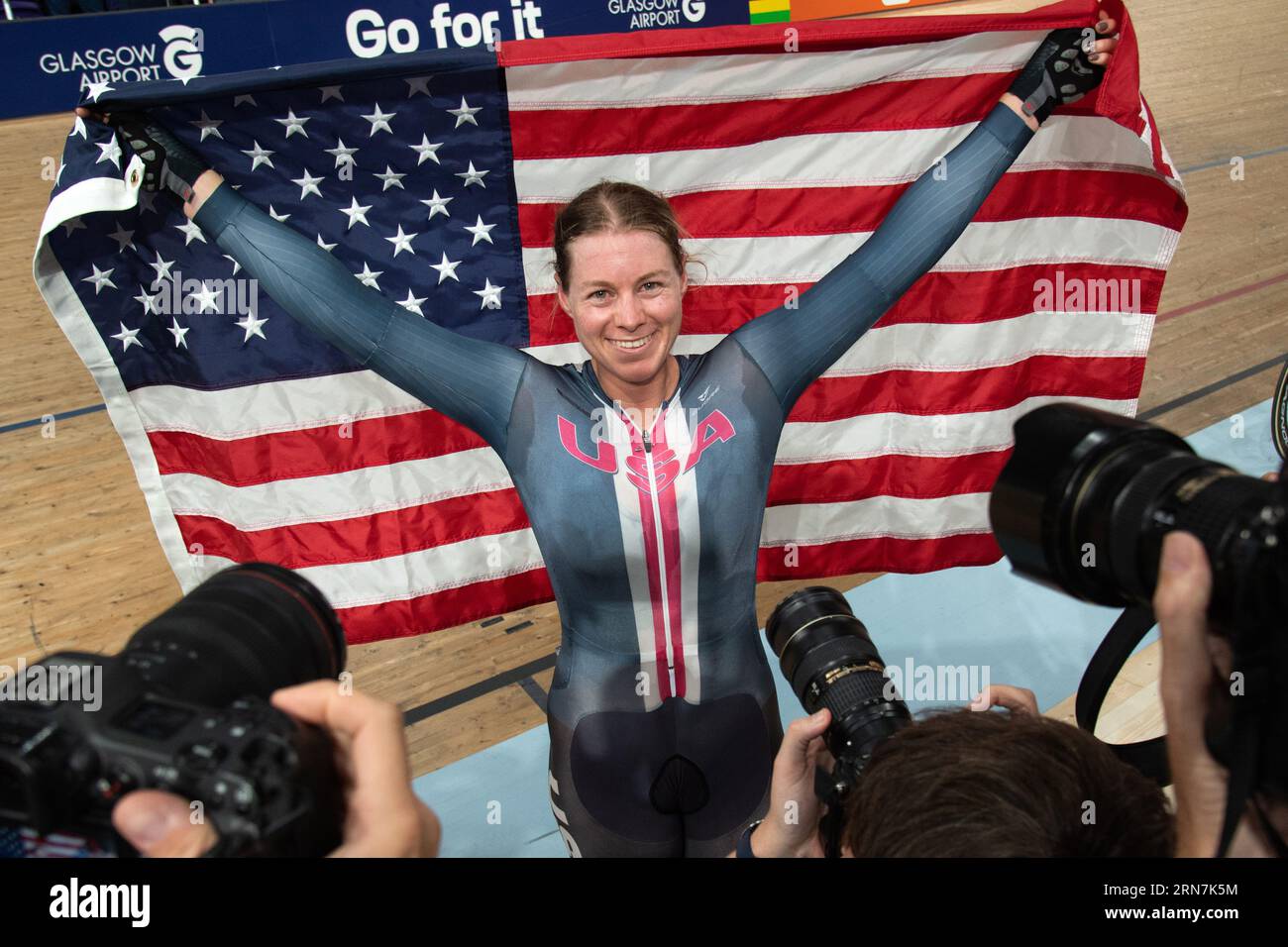 Jennifer Valente of the USA celebrates with the flag after winning the ...