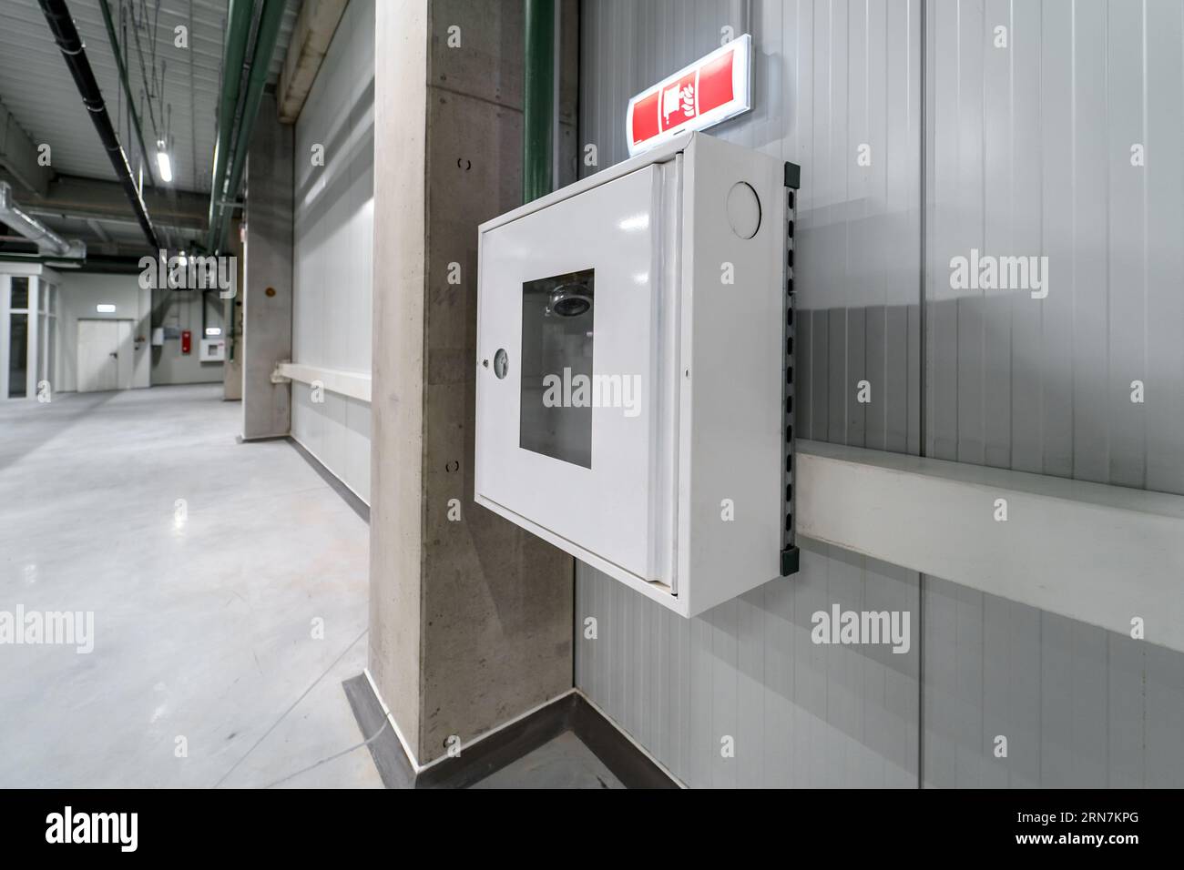 Fire hydrant cabinet in a new industrial building Stock Photo - Alamy