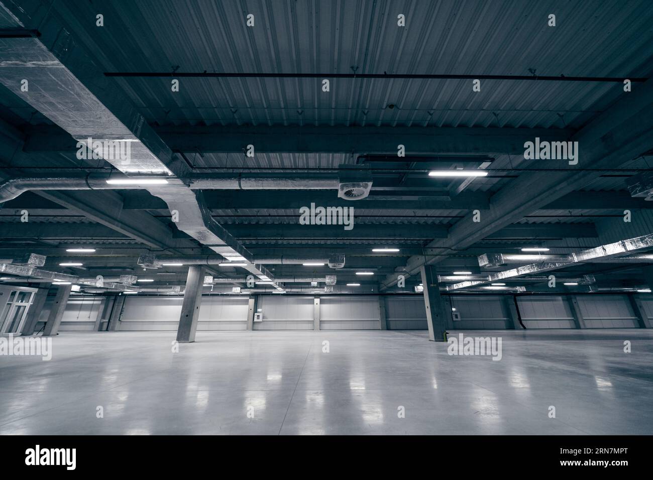 Empty industrial hall with ceiling ventilation system Stock Photo - Alamy