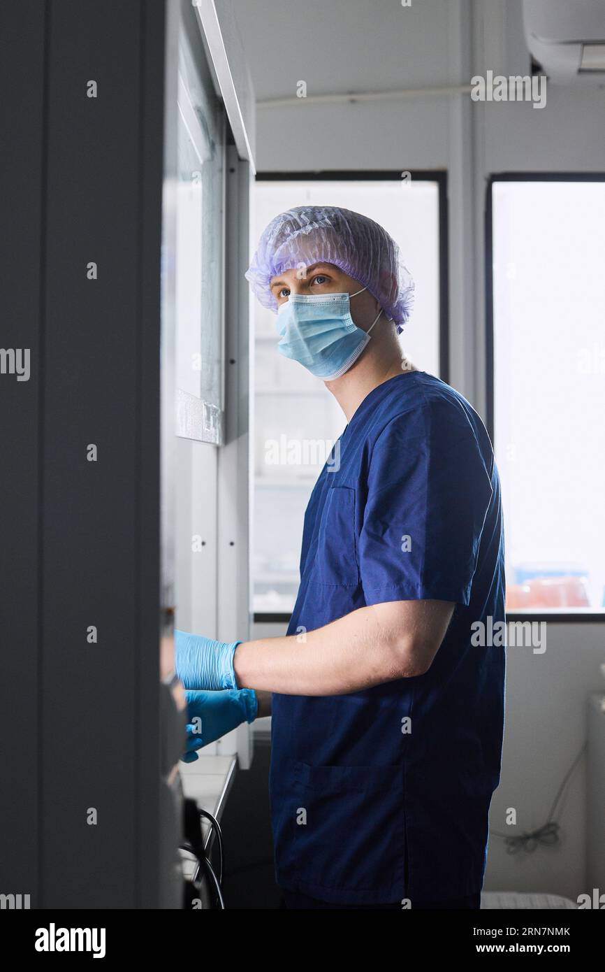 Scientists work in the laboratory. A researcher conducts laboratory ...