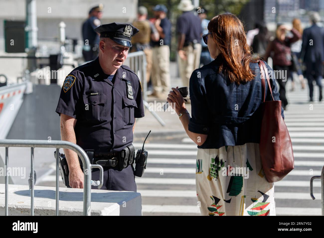 A police stands guard outside the United Nations headquarters in New ...
