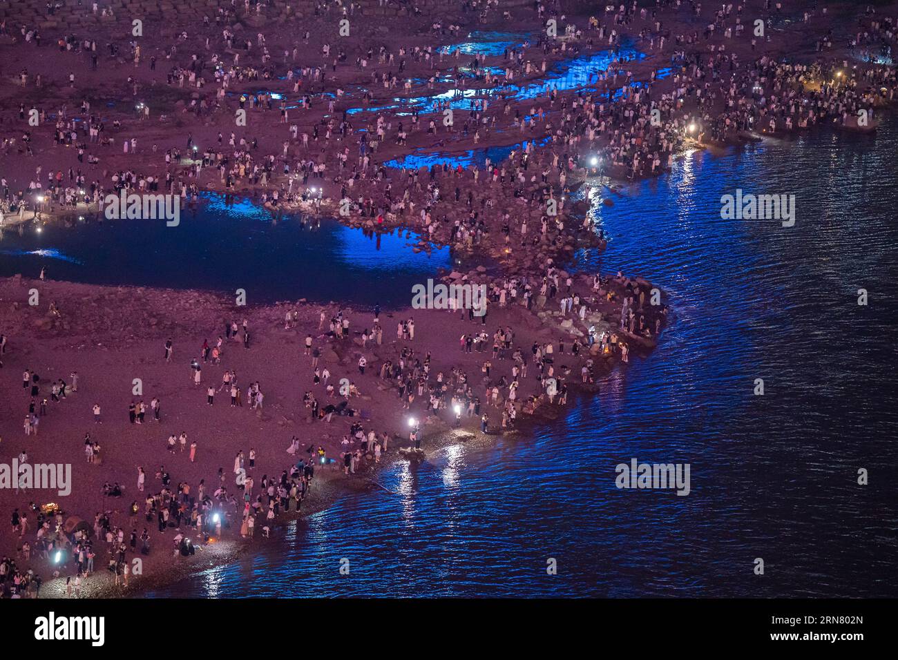 CHONGQING, CHINA - APRIL 30, 2023 - Tourists enjoy the night view of ...