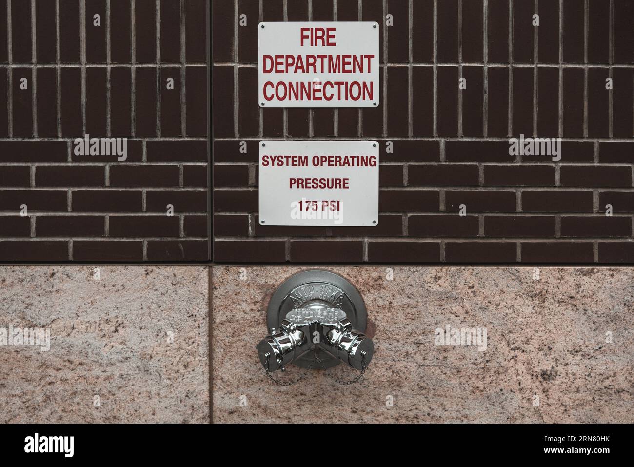 Fire hydrant water pipe, mounted in a building wall. Manhattan USA ...