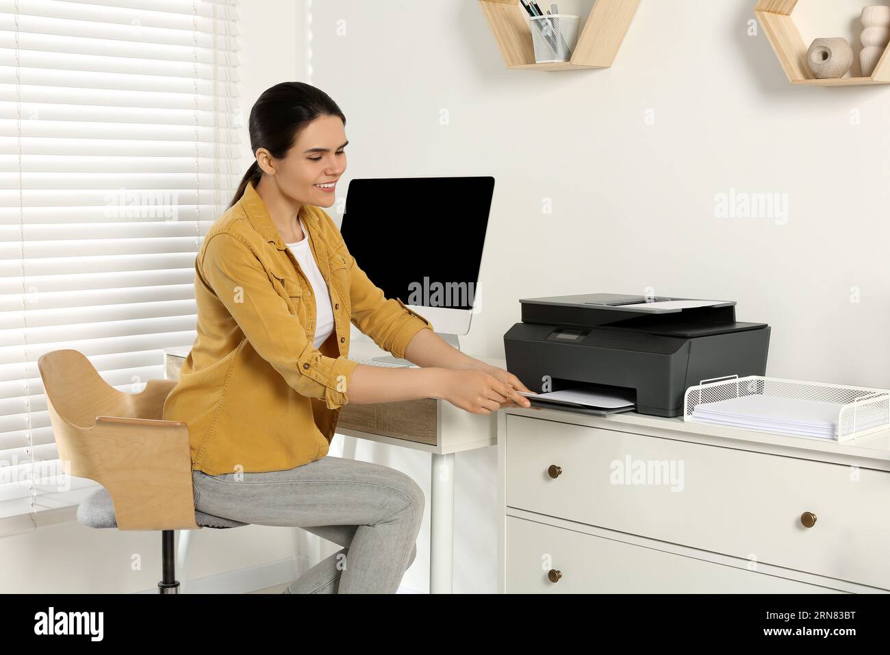 Person using printer at home hi-res stock photography and images - Alamy