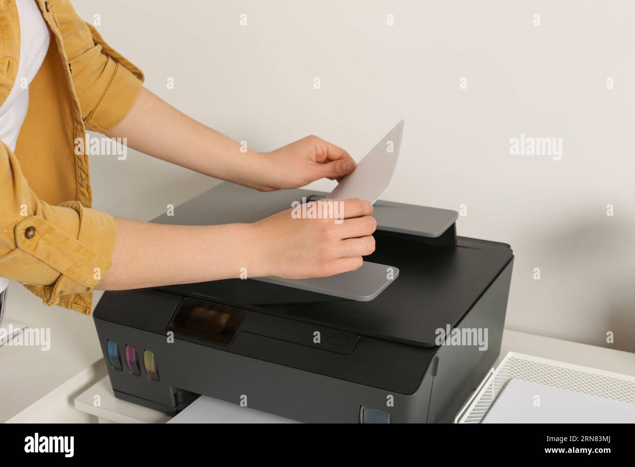 Person using printer at home hi-res stock photography and images - Alamy