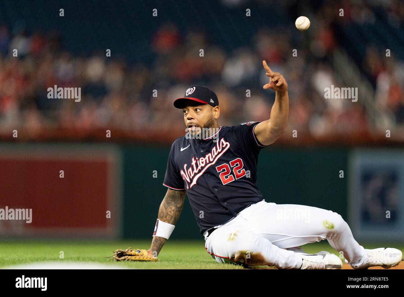 Washington Nationals first baseman Dominic Smith (22) is unable to ...