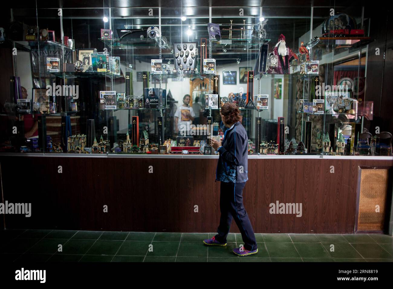 A man looks on exhibits at the interactive museum The House of Asher ...