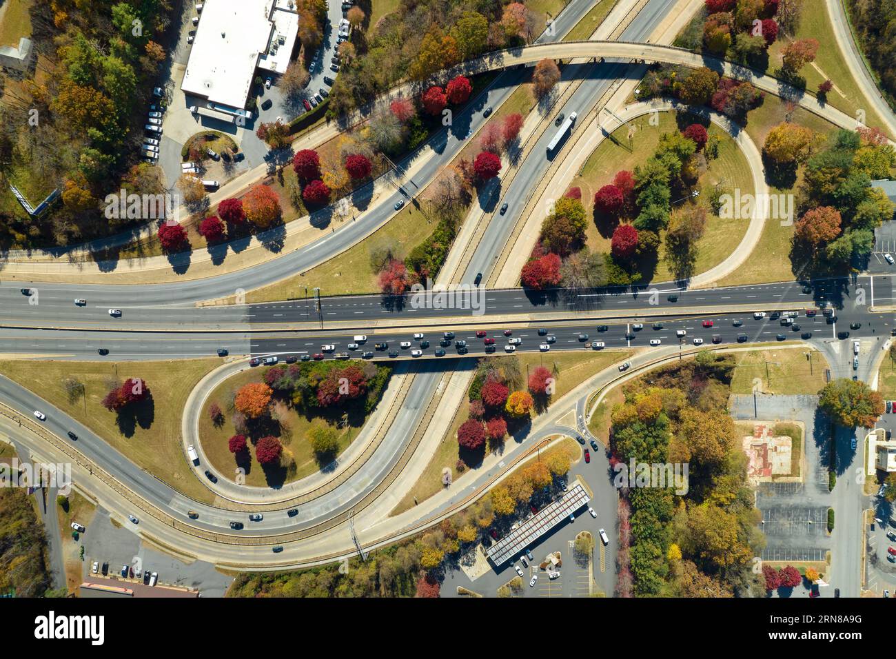 Aerial view of american freeway intersection with fast moving cars and ...