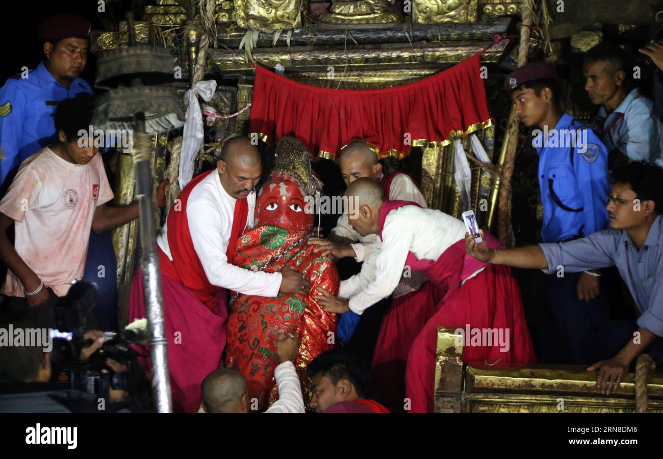 LALITPUR, Oct. 18, 2015 -- Priests take the idol of Rato Machhendranath ...