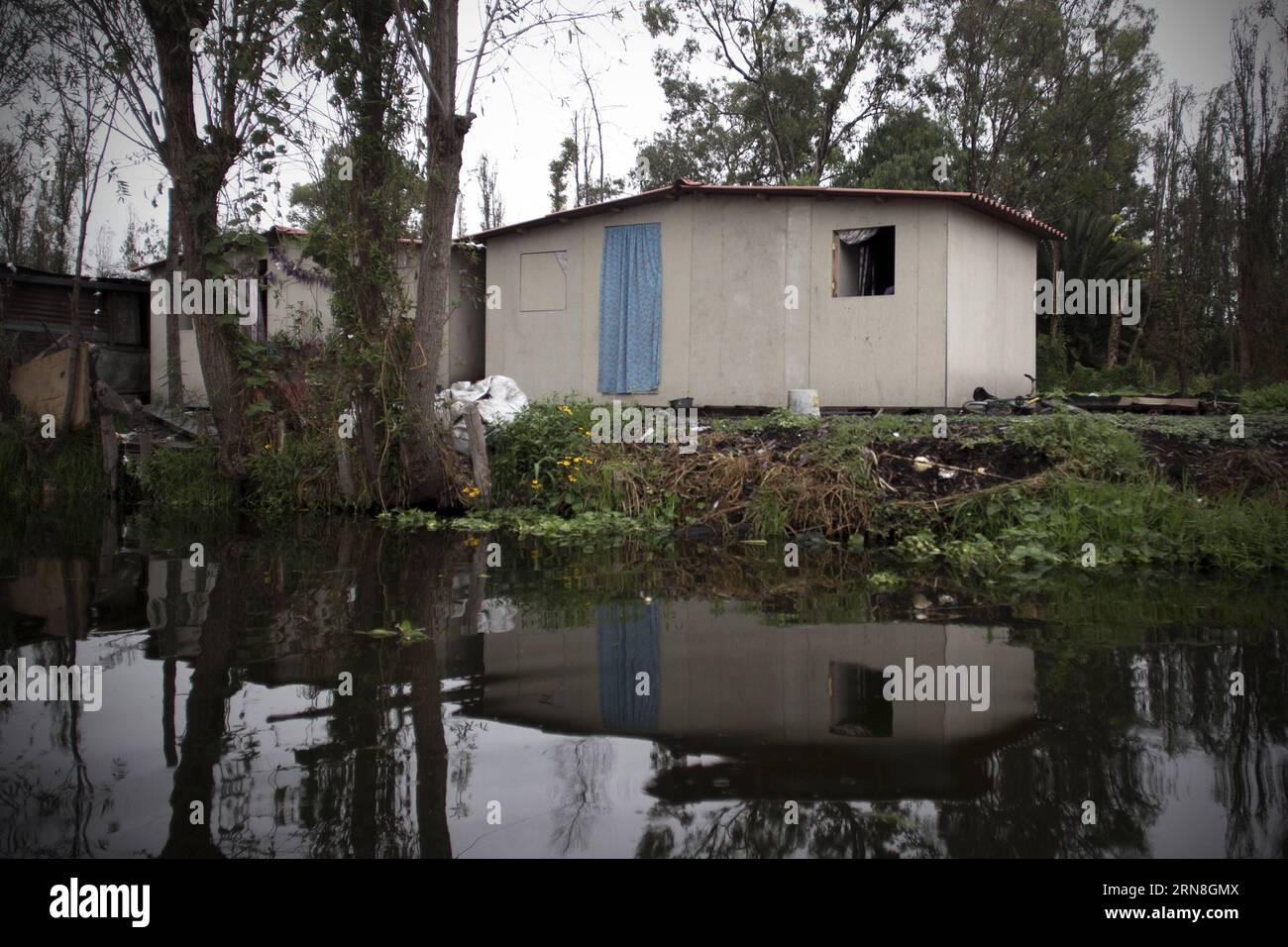 Image taken on Oct. 18, 2015 shows the exterior of the completed houses ...