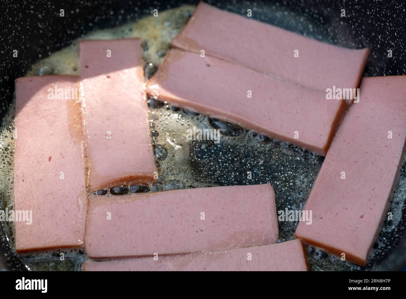 Fried Bologna on pan , Breakfast Stock Photo - Alamy