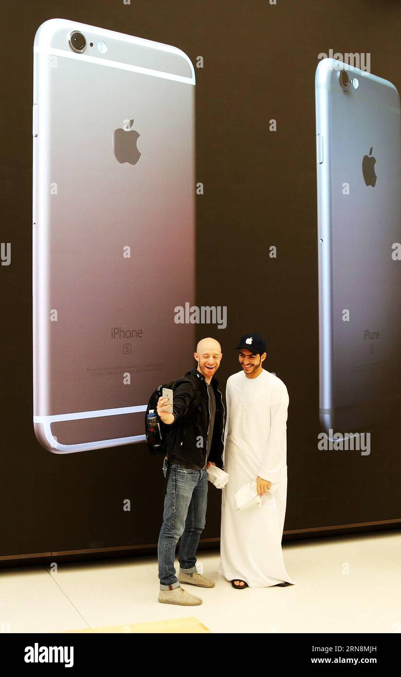 (151029) -- DUBAI, Oct. 29, 2015 -- Customers take a selfie in an Apple ...