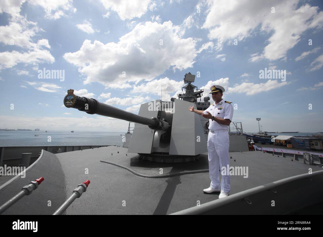 Kunal Rajkumar, an Indian navy commanding officer, shows the Otobreda ...