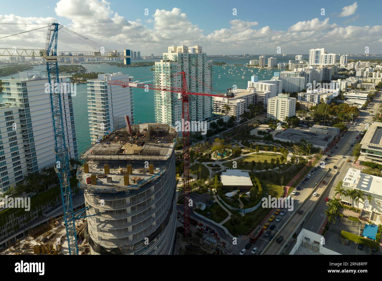 Tower lifting cranes at high residential apartment building ...