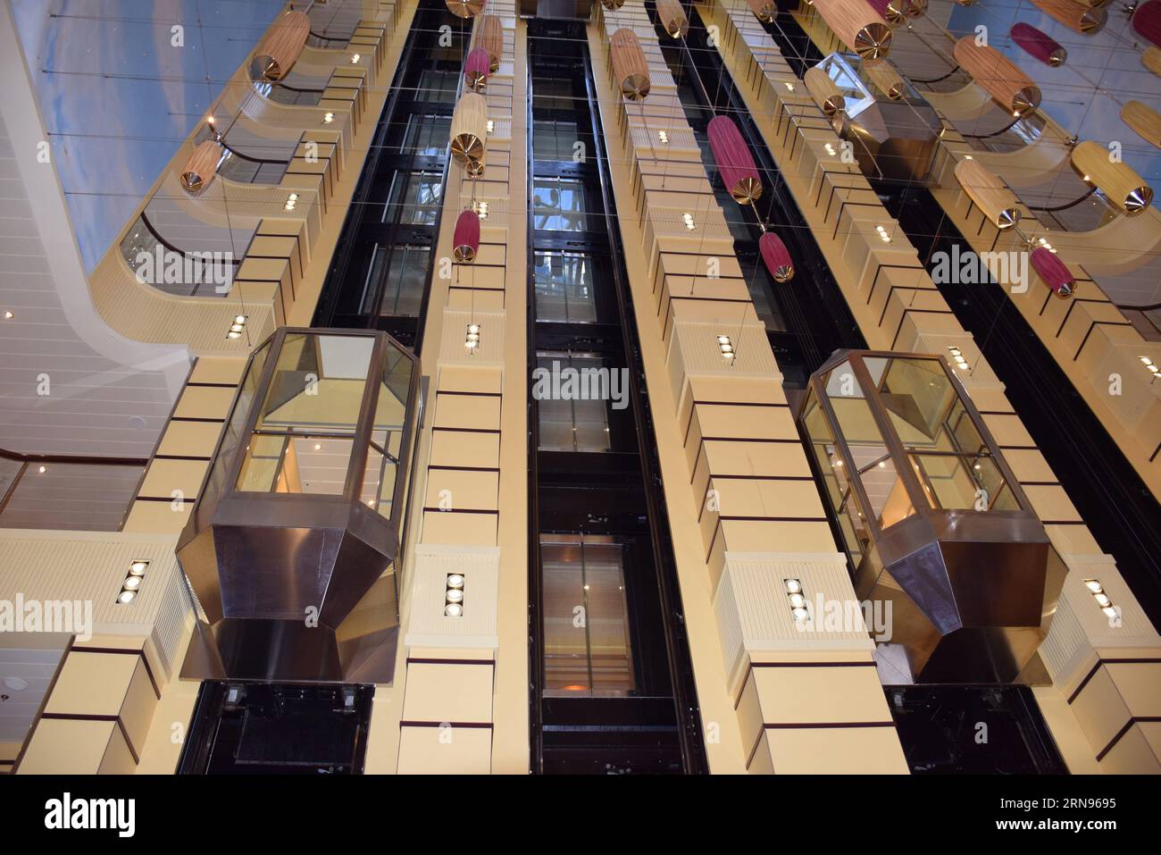 Beautiful Glass Elevators inside a famous Cruise Ship Stock Photo - Alamy