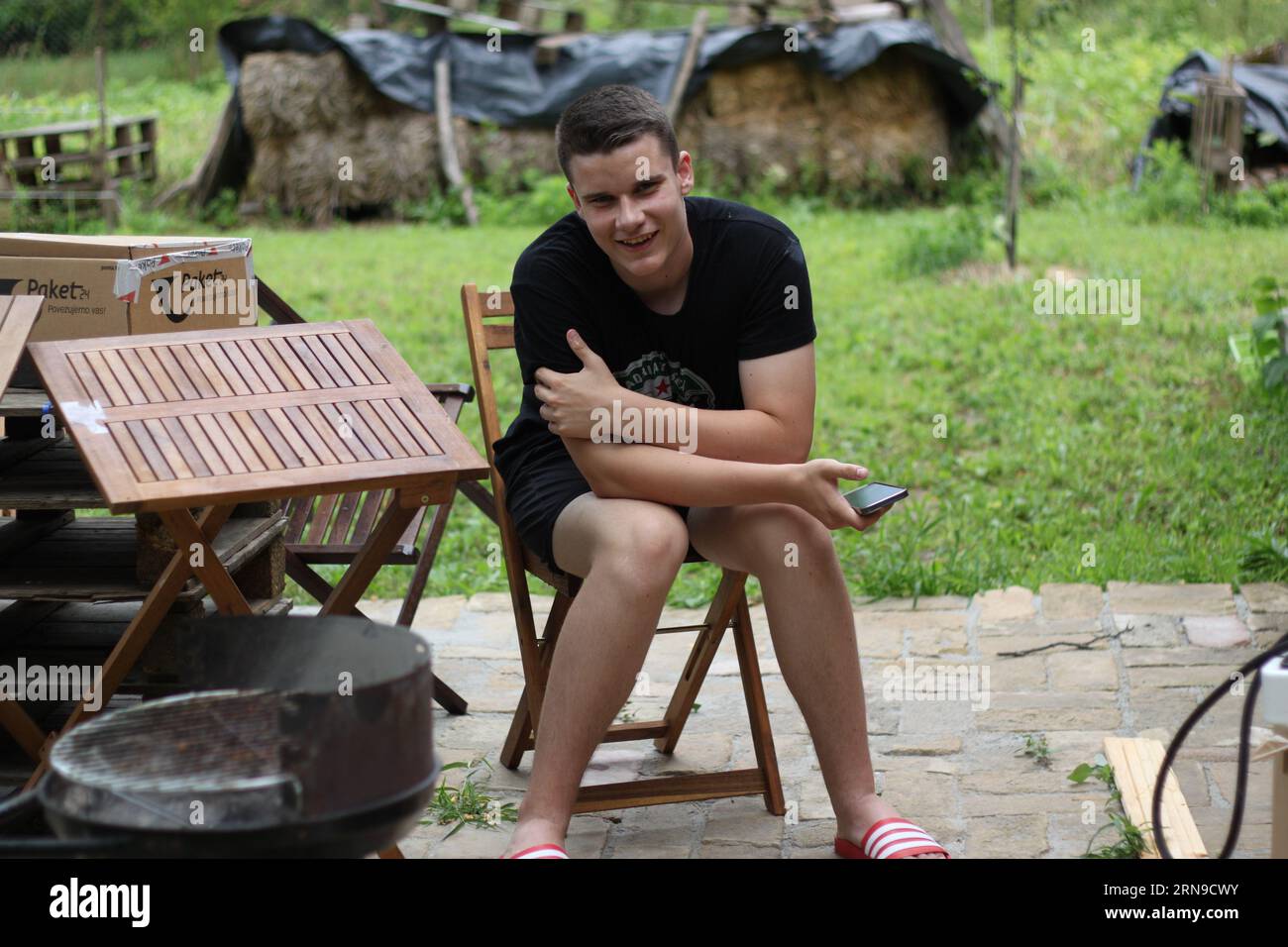 A young man in moments of rest and relaxation after painting the ...