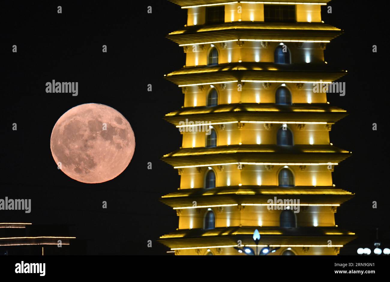 The year's largest supermoon appears in the night sky in Korla City, northwest China's Xinjiang ...