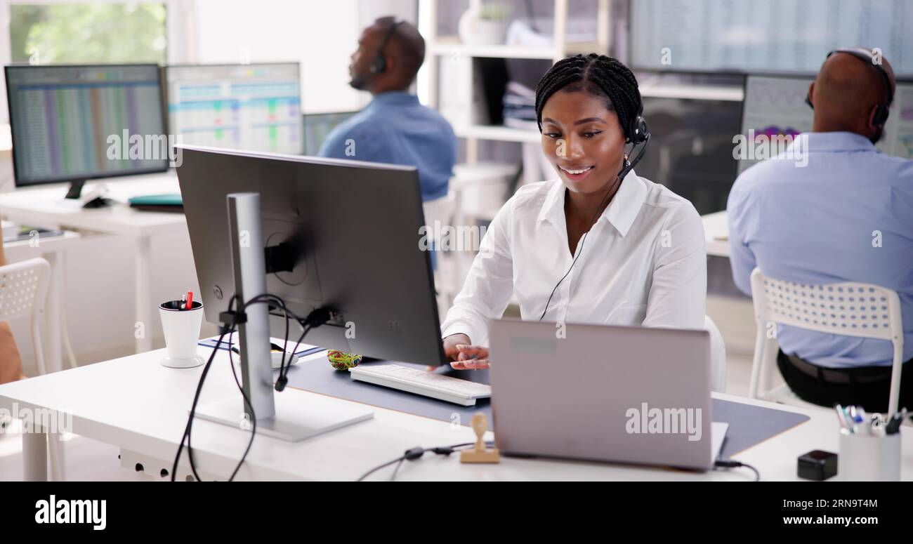 Portrait Of A Smiling African Female Customer Service Executive Stock ...