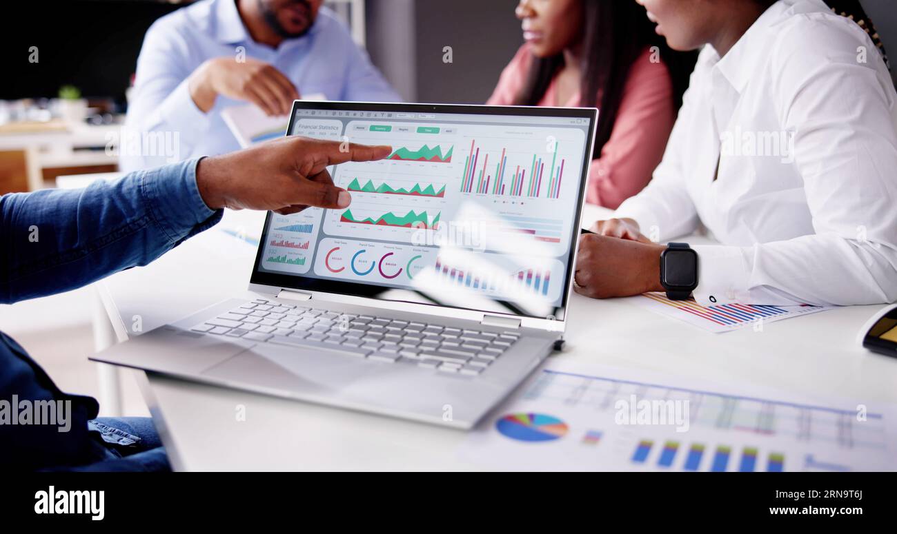 Financial Advisor Group Meeting Examining Analytics Dashboard Stock ...