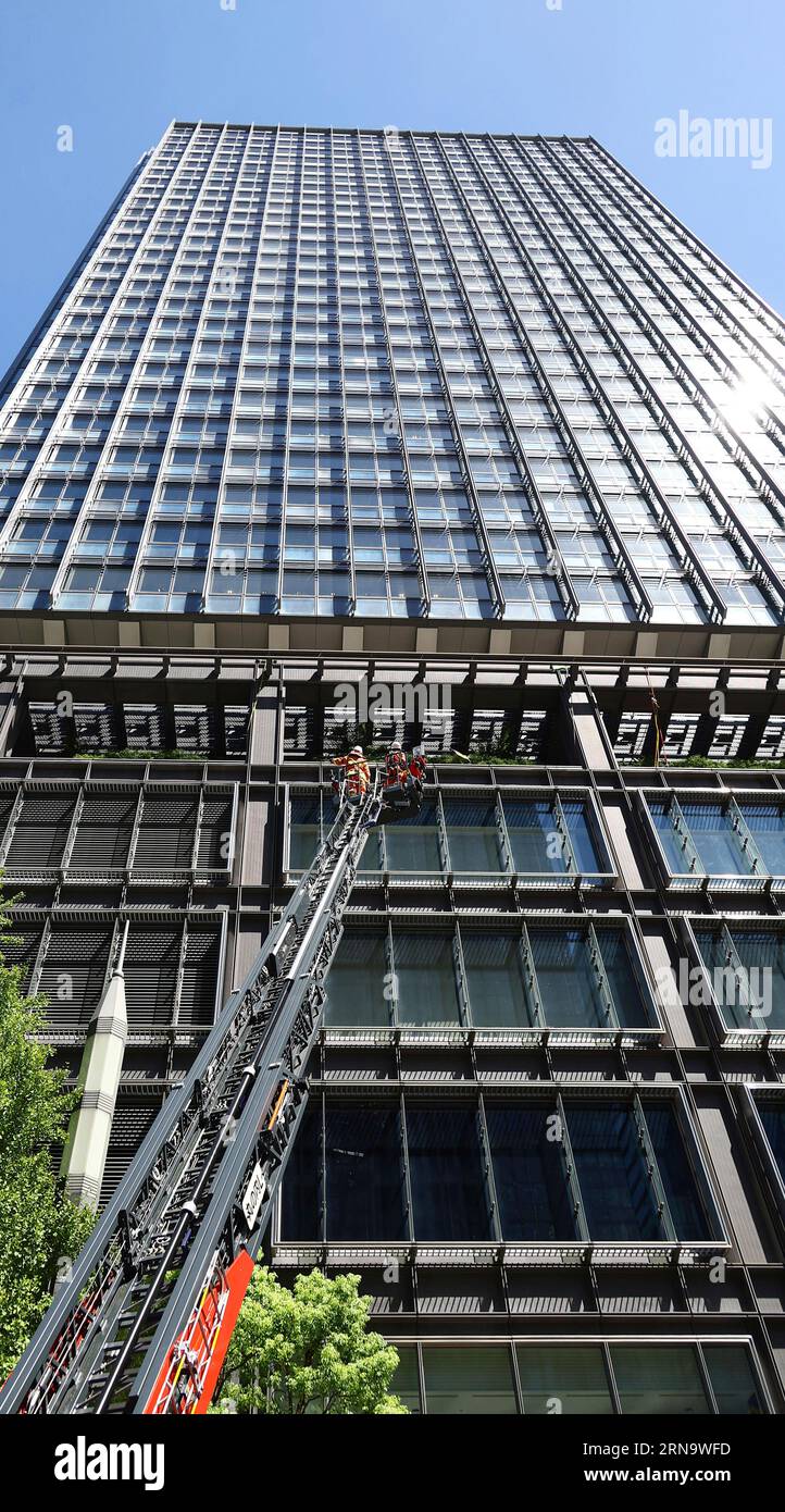 Disaster drill simulating a fire caused by an earthquake is held at ...