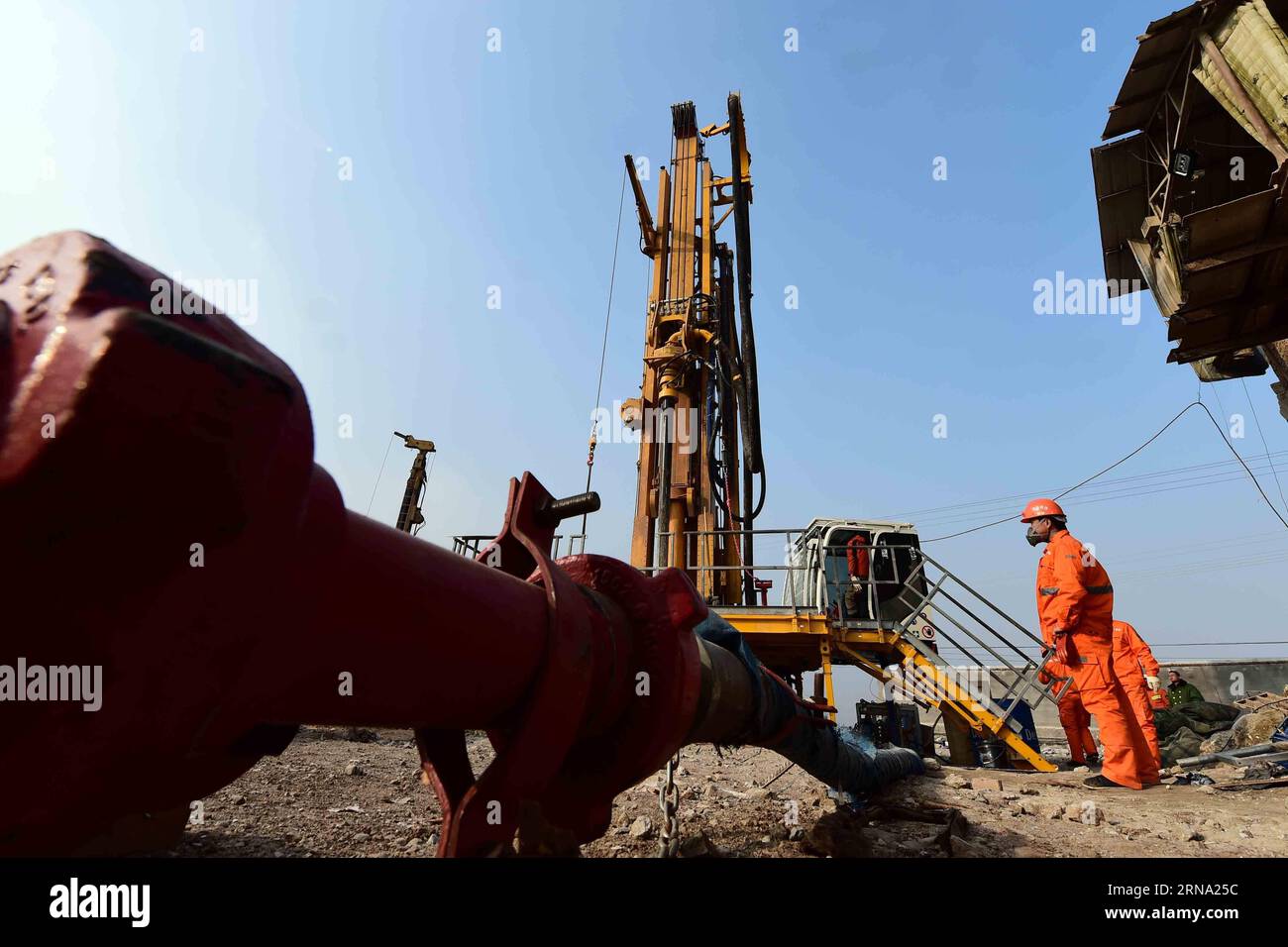 Rescuers work at a collapsed mine in Pingyi County, east China s ...