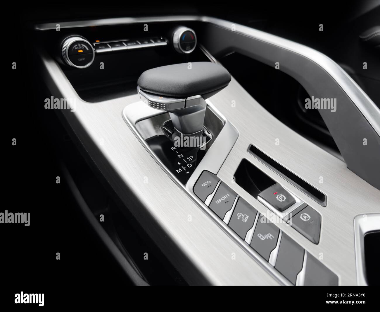 Automatic gear stick of a modern car. Modern car interior details ...