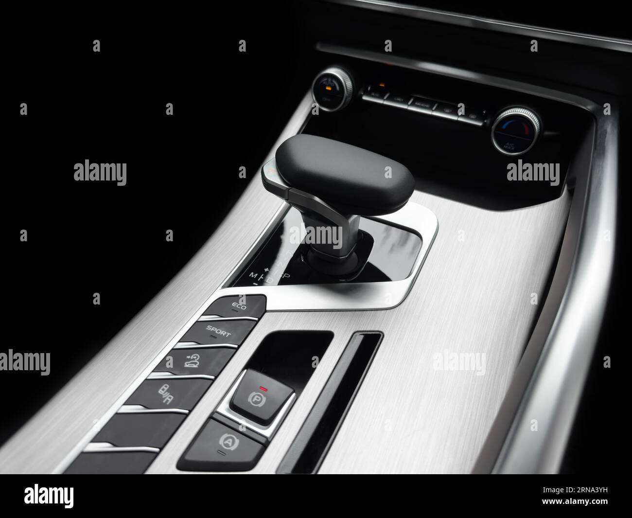 Automatic gear stick of a modern car. Modern car interior details ...
