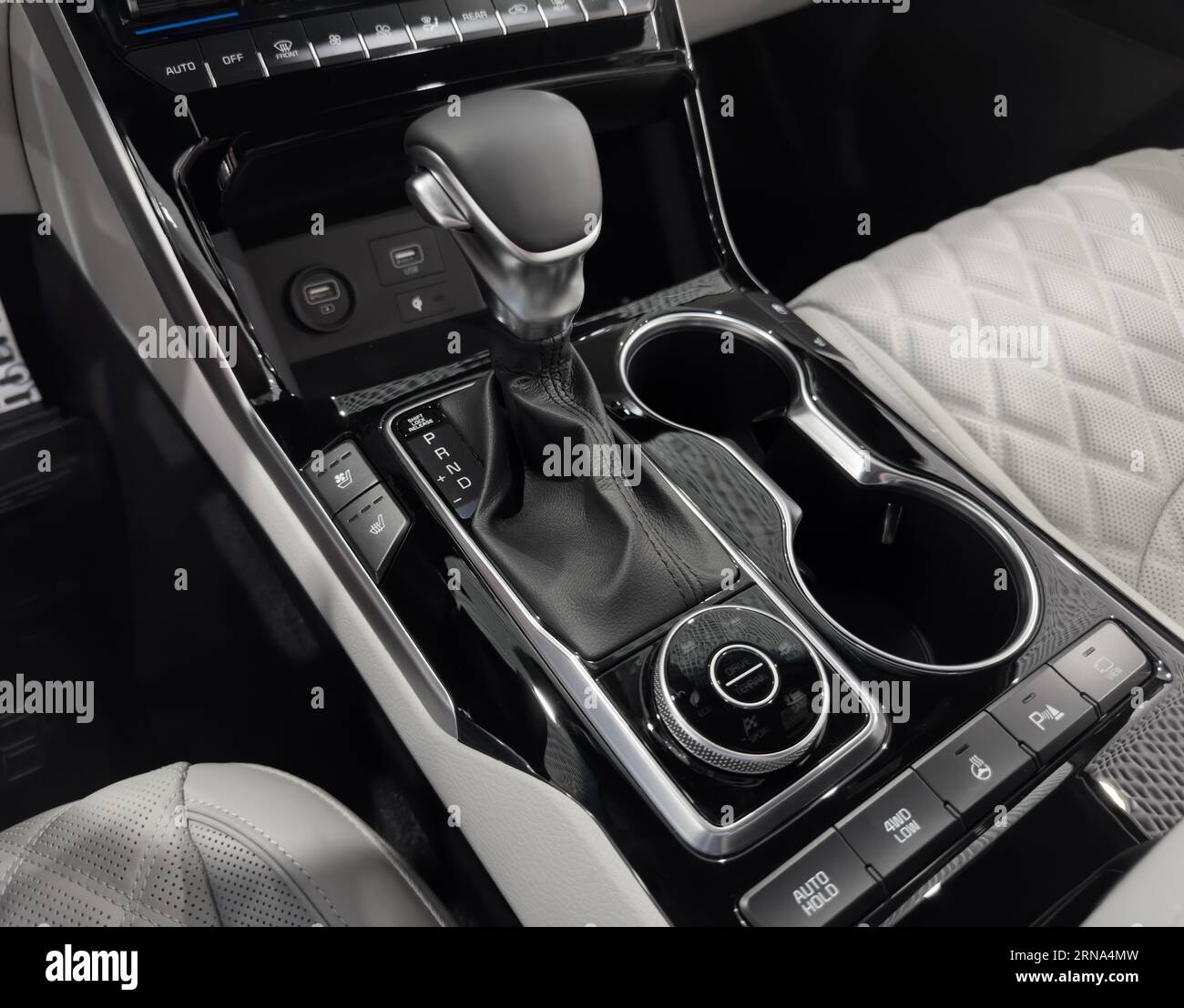 Automatic gear stick of a modern car. Modern car interior details ...