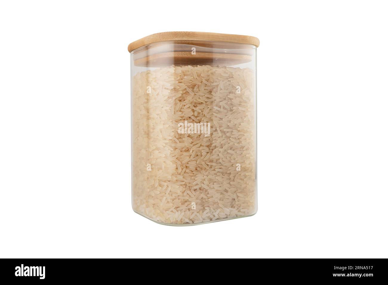 Rice in a glass jar isolated on a white background. Raw white organic ...