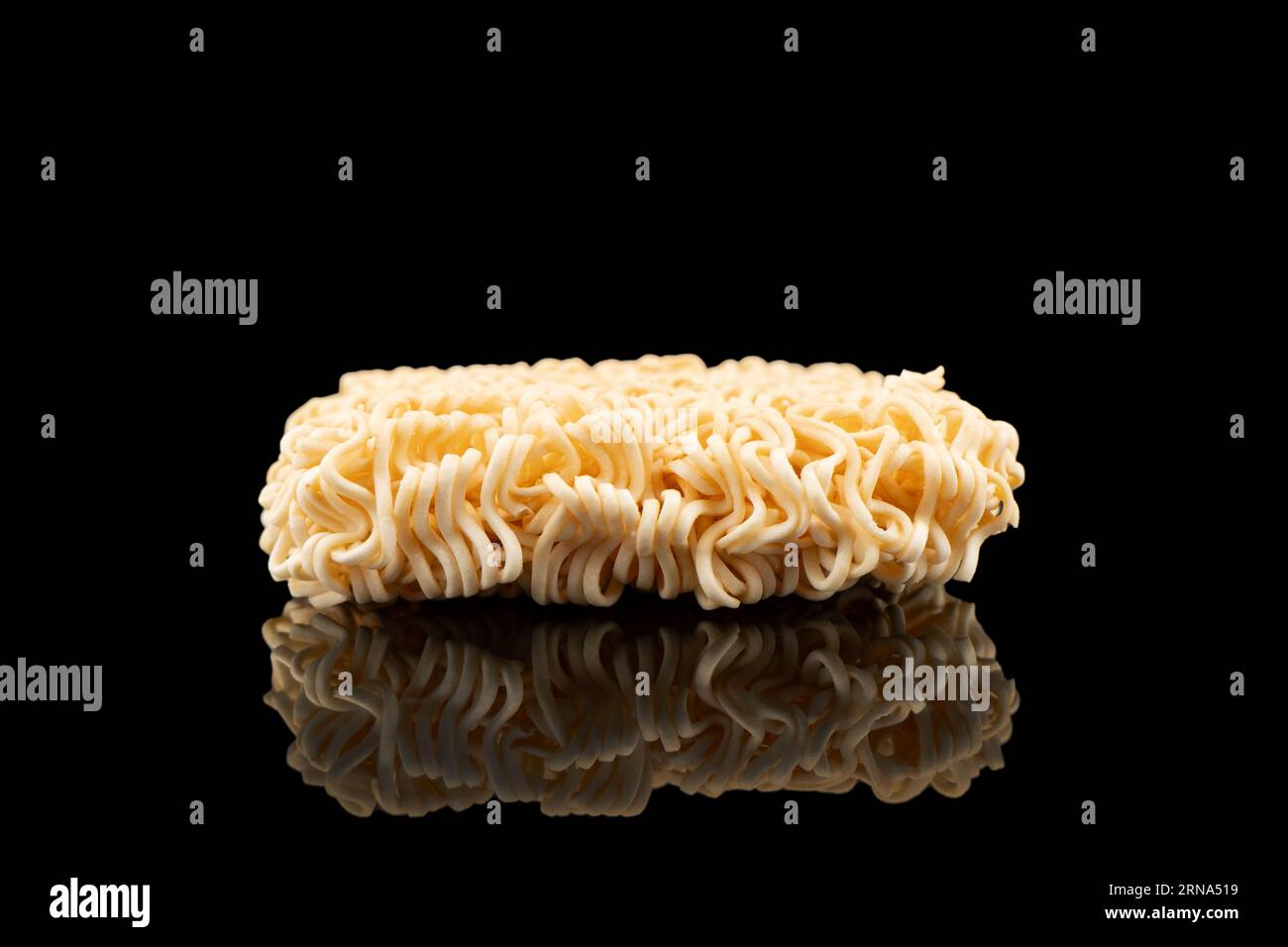 Texture of dry instant noodles isolated on black background. Raw dried ...