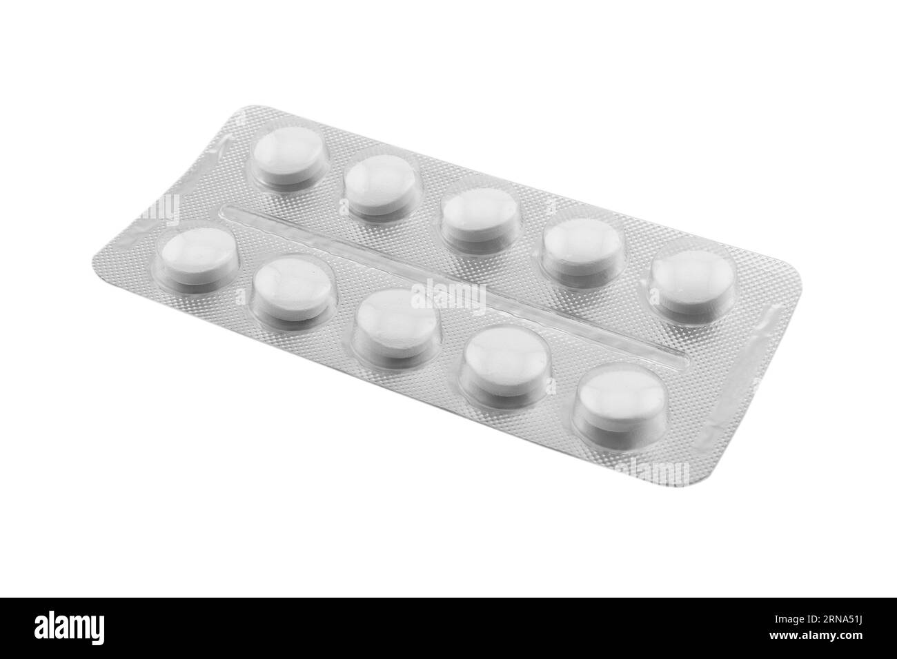 Macro shot pile of tablets pill in silver blister packaging isolated on ...