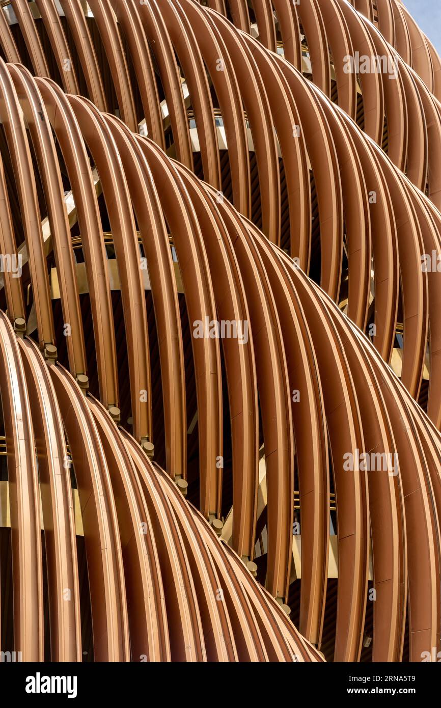 Closeup view of building facade details in a curved shape. wallpaper ...