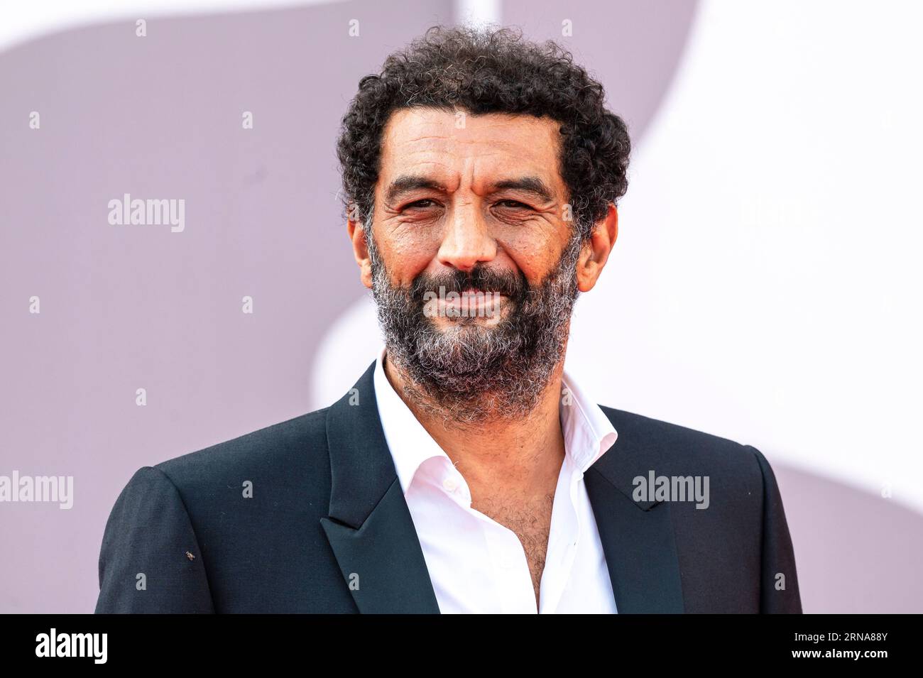 Venice, Italy. August 31, 2023. Ramzy Bedia arrives at the premiere of ...