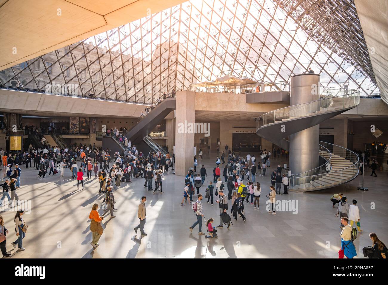 PARIS, FRANCE - APRIL 16, 2023: Crowded entrance hall under the glass ...