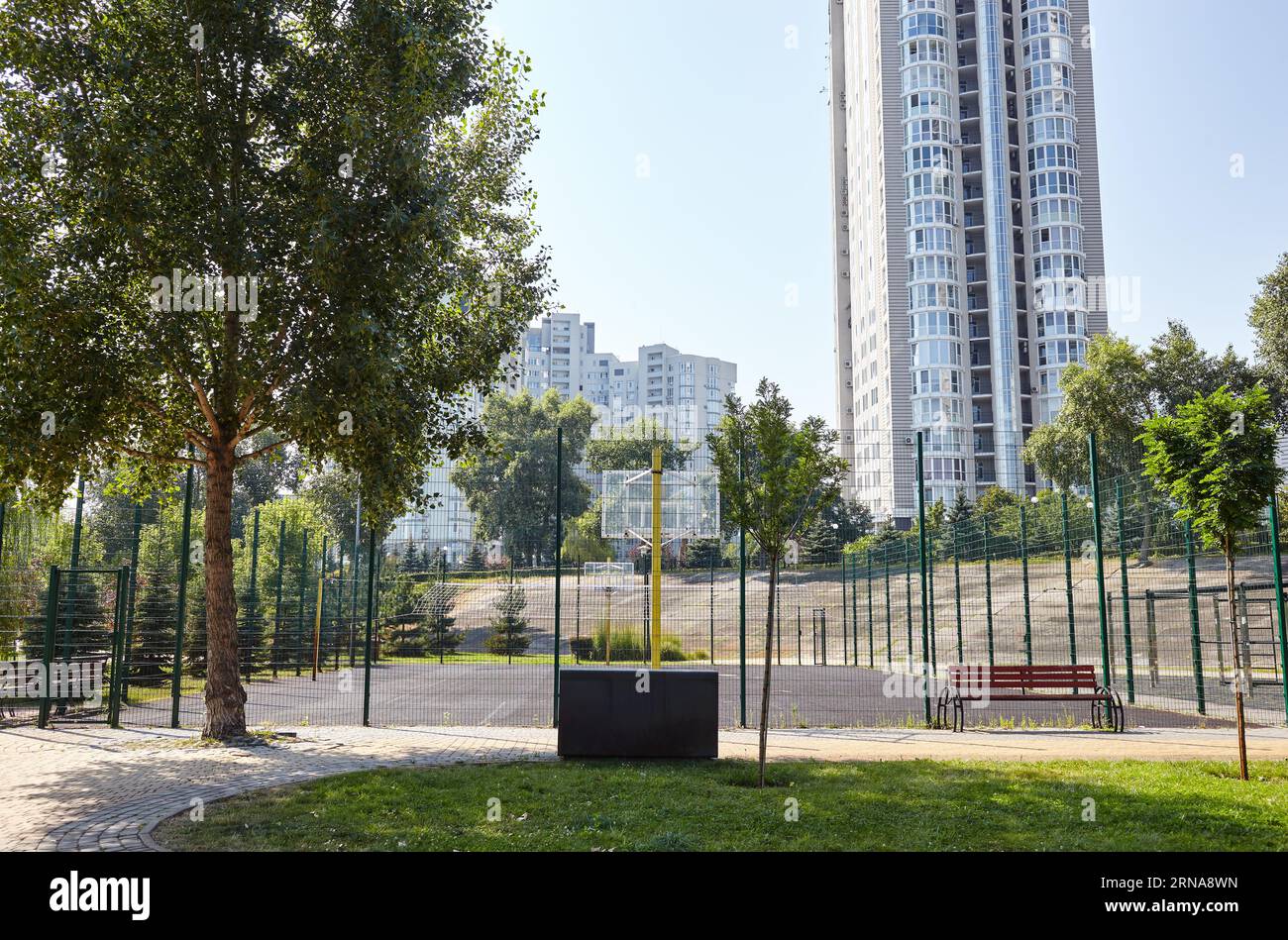 Basketball court in the city park. Recreation area and active games in ...