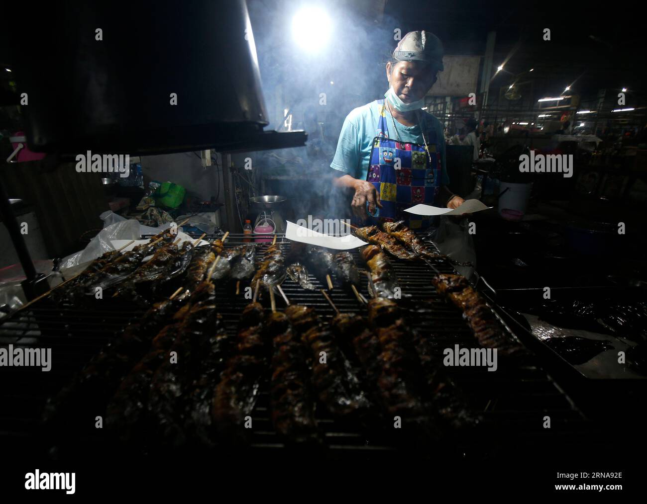 Nakhon Sawan, Thailand. 01st Sep, 2023. A vendor waits for customers to ...