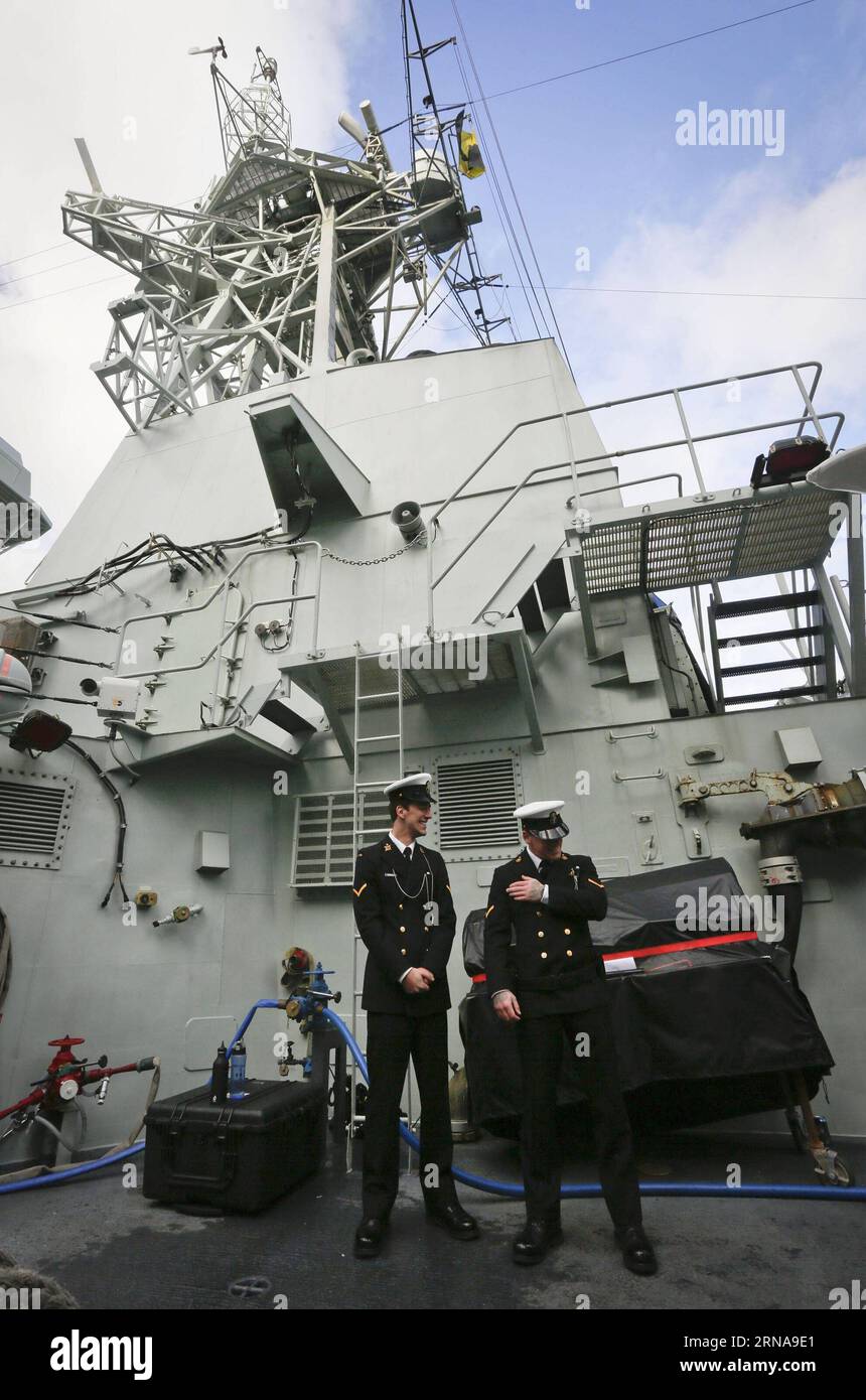 VANCOUVER, -- Crew members of Canadian Navy stand on the deck of HMCS ...
