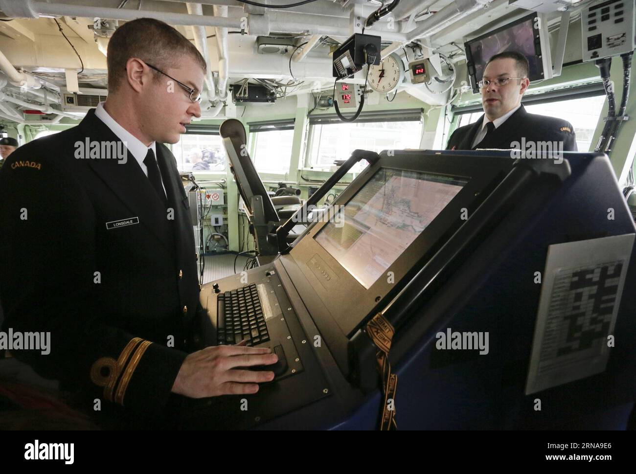 VANCOUVER, -- Navy crew operates an upgraded equipment inside the ...