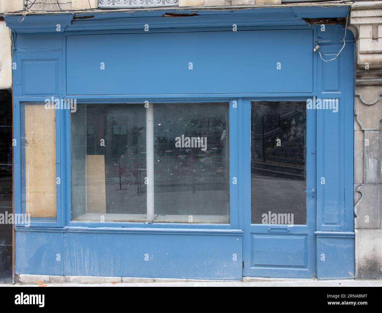 ancient shop windows entrance blue old facade of closed store wall ...