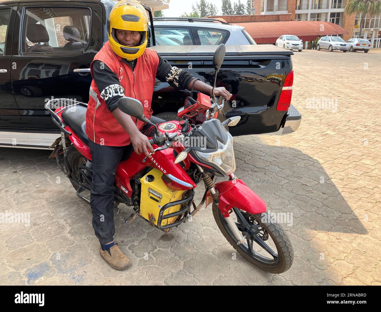 Kigali, Rwanda. 21st June, 2023. Albert Nzigirimana on his motorcycle ...