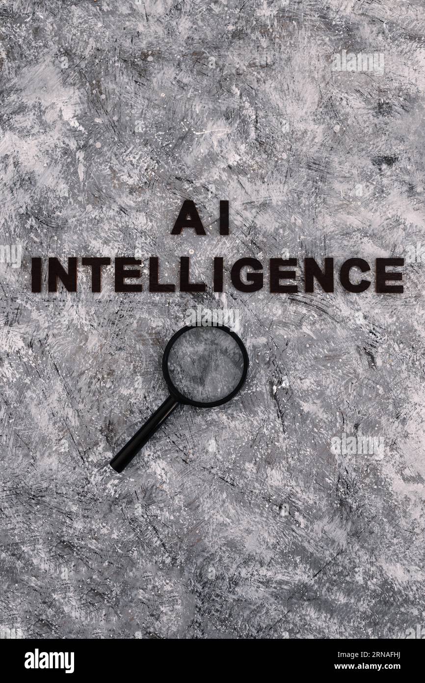 AI intelligence text with magnifying glass analysing it, concept of ...