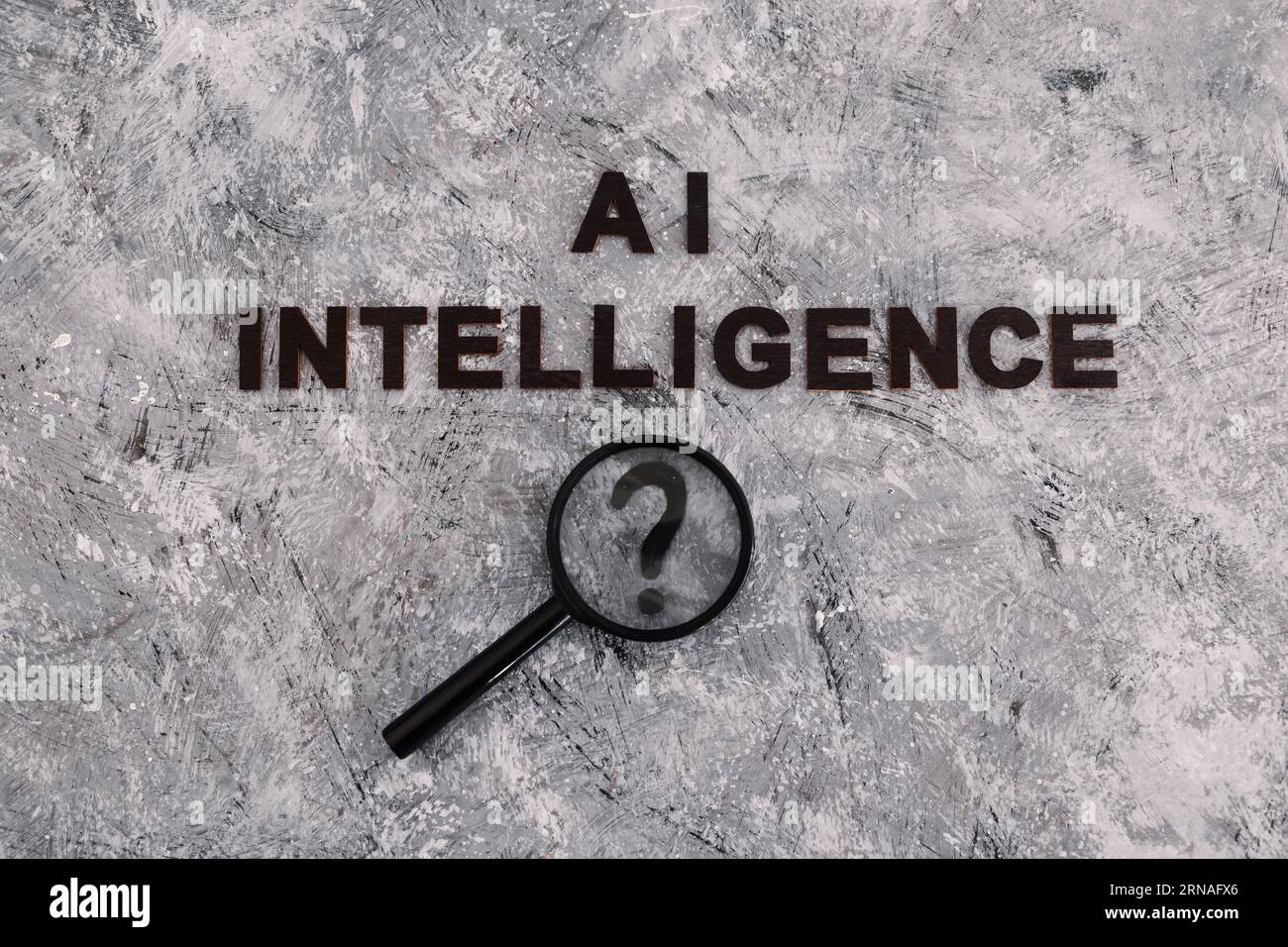 AI intelligence text with magnifying glass analysing a question mark ...