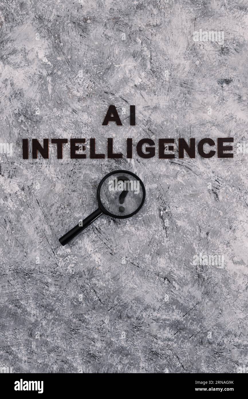 AI intelligence text with magnifying glass analysing a question mark ...