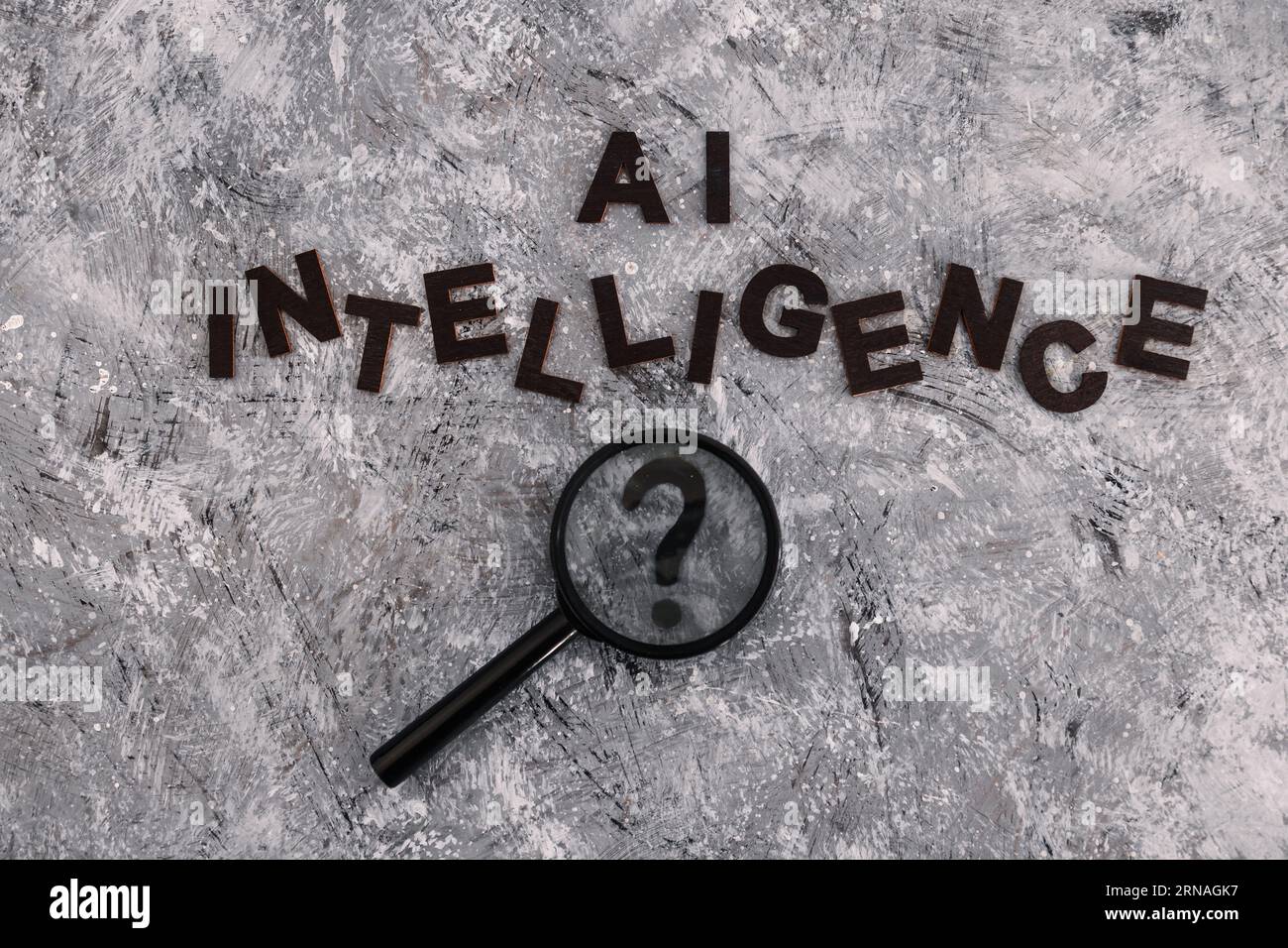 AI intelligence text with magnifying glass analysing a question mark ...