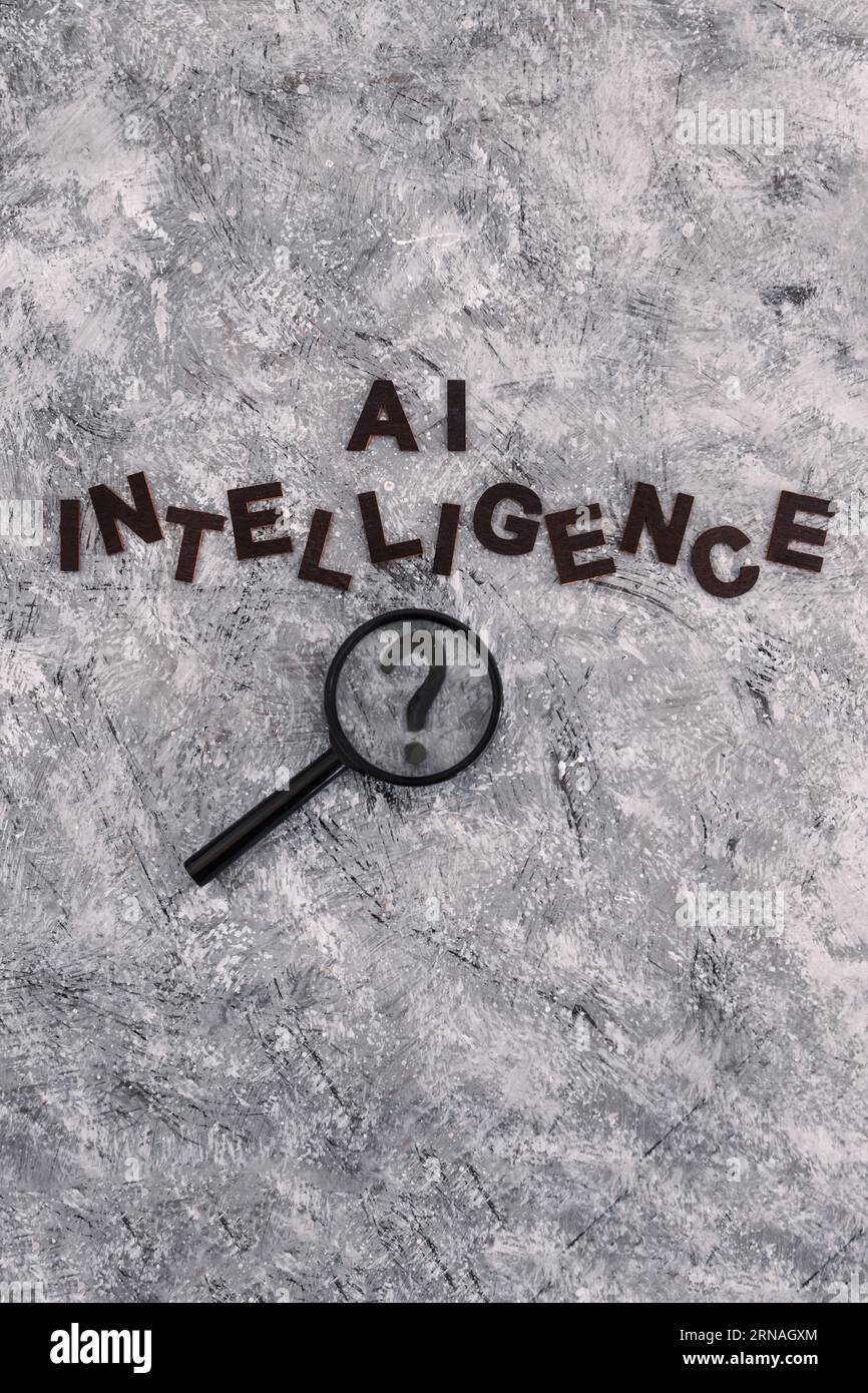 AI intelligence text with magnifying glass analysing a question mark ...