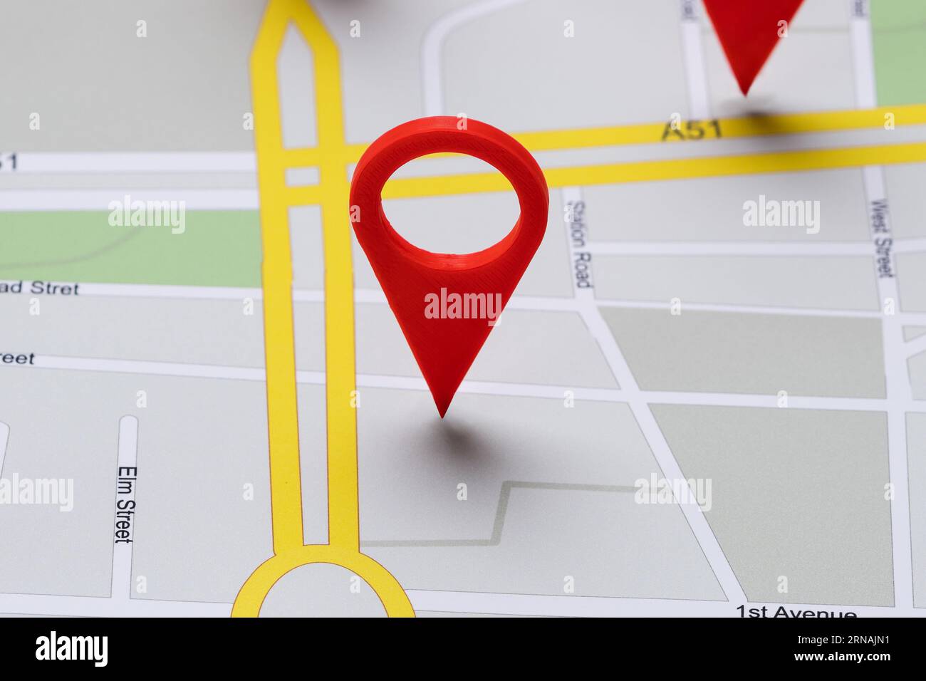 Close-up Of A Road Map With Red Navigation Icons Stock Photo - Alamy